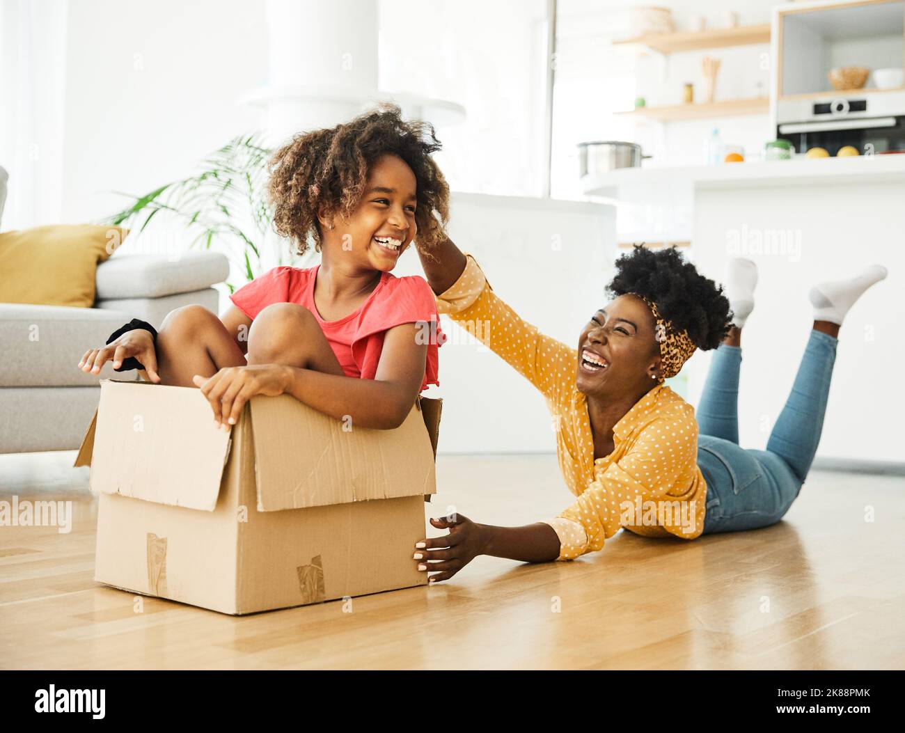 child family mother fun happy girl happiness daughter box together ...