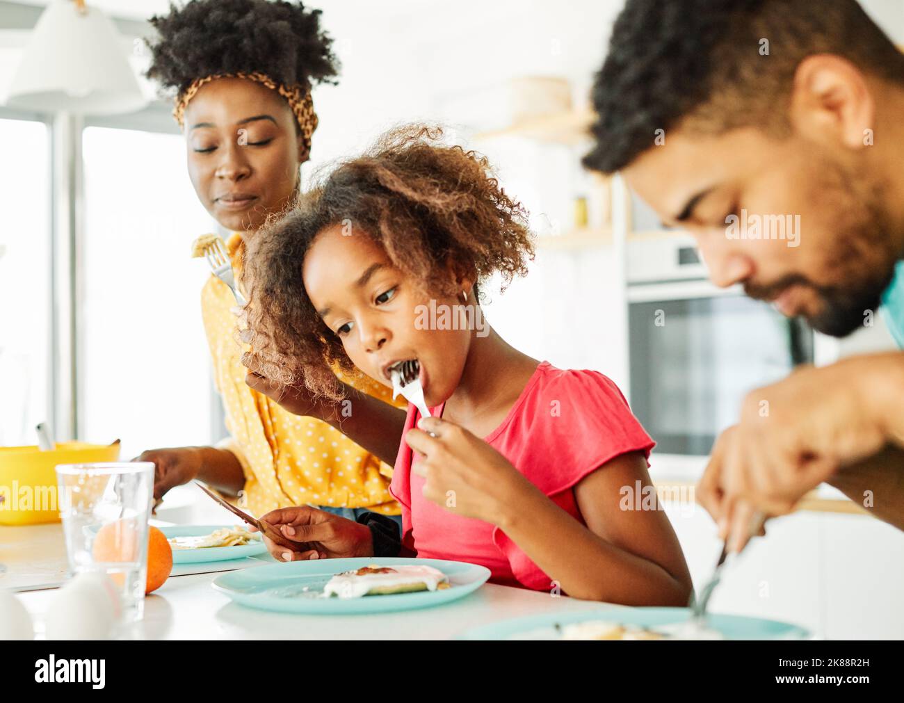 Black Child Eating Breakfast