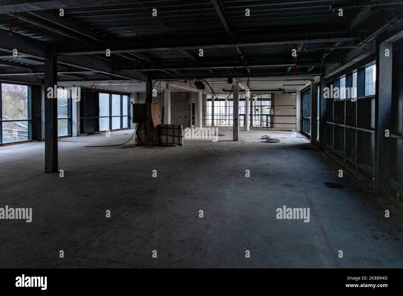 A big empty hall inside a building with big panoramic windows Stock ...