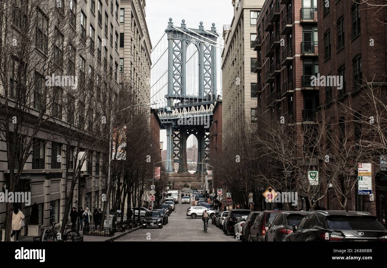 The famous Manhattan Bridge seen in between two buildings Stock Photo ...
