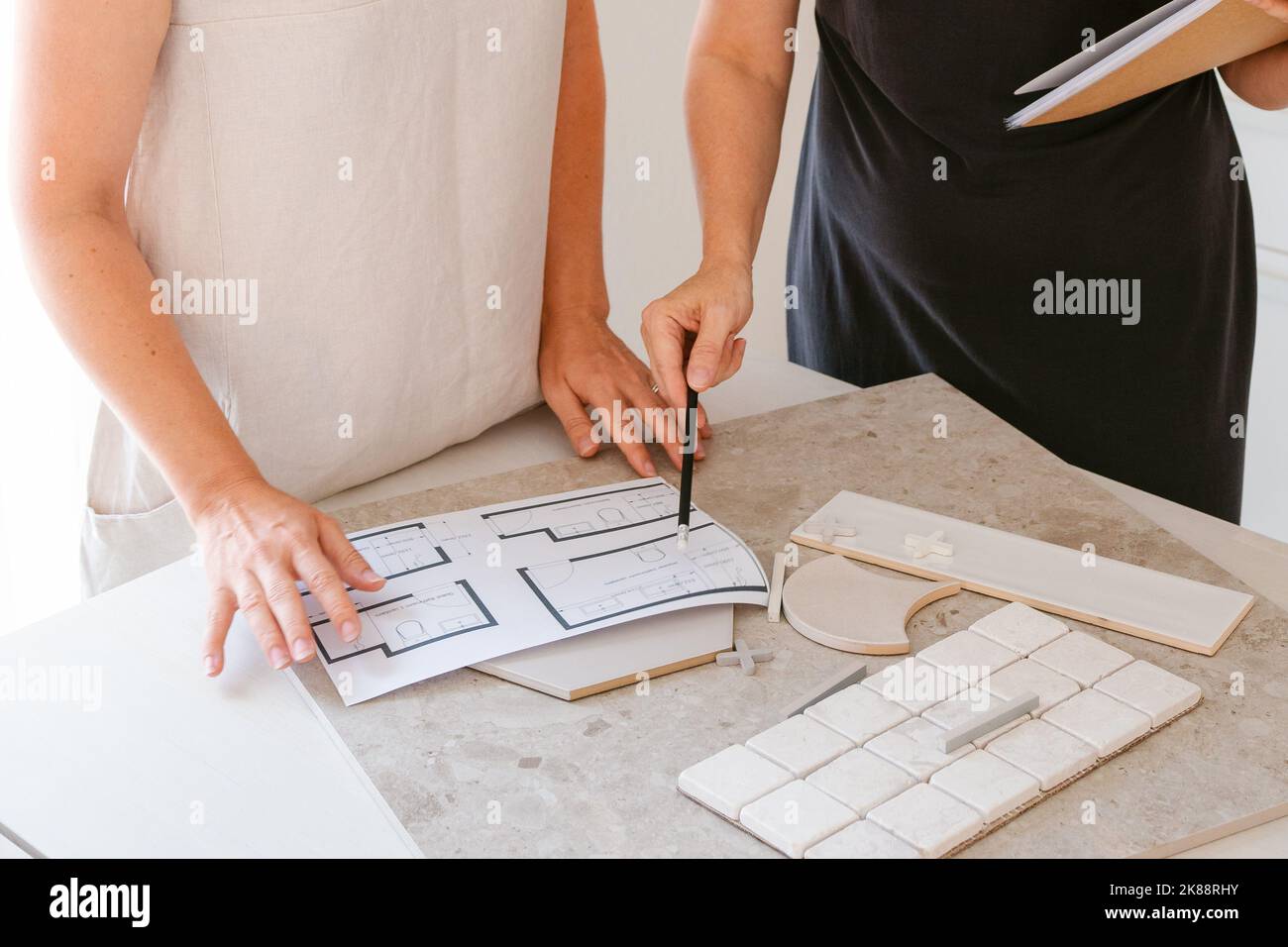 The women planning the interior design Stock Photo - Alamy