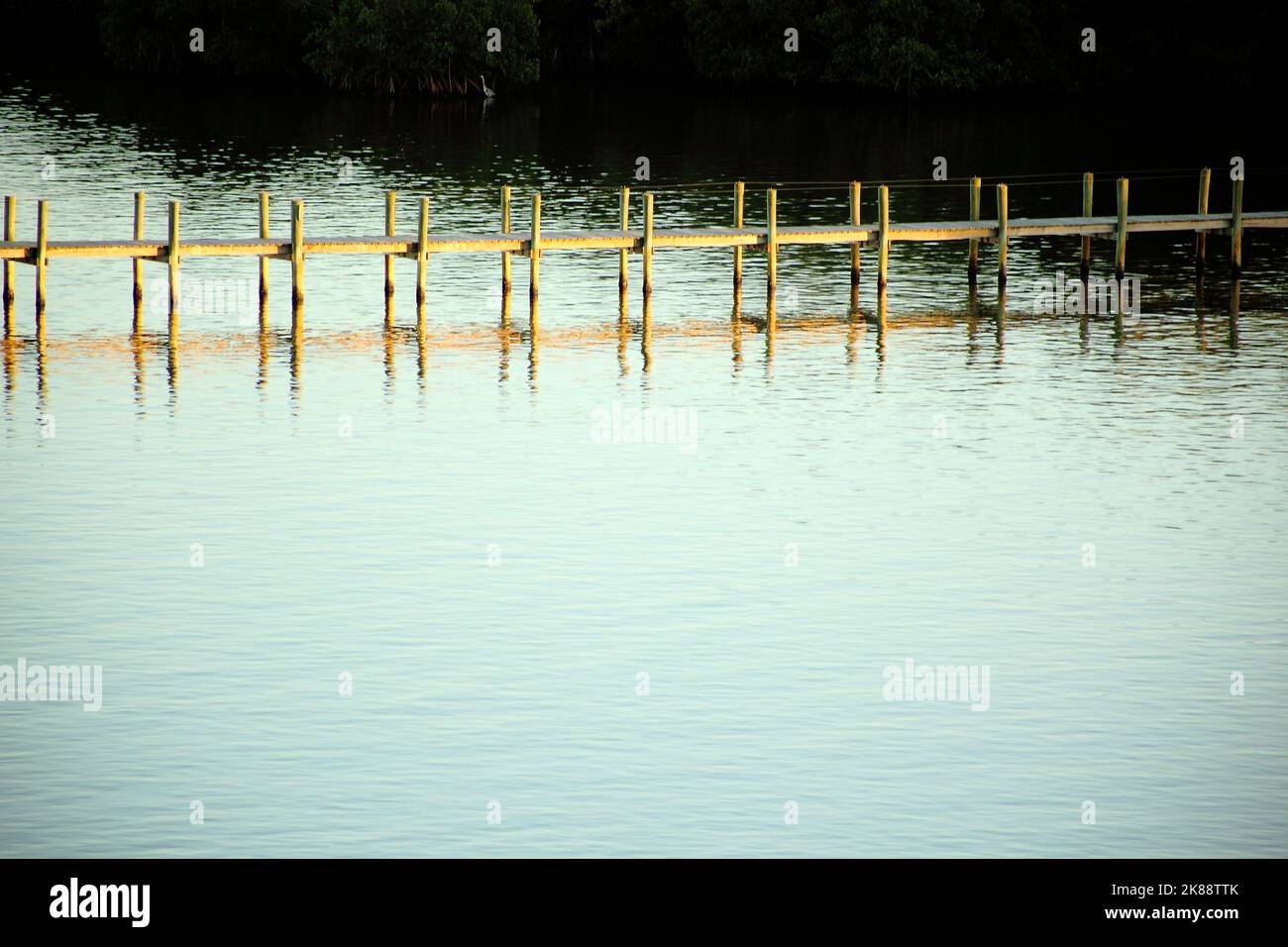 The inlet architecture. A fence in the water Stock Photo - Alamy