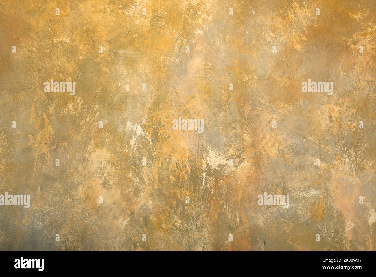 Weathered grunge yellow faded house plastered wall closeup as grungy ...