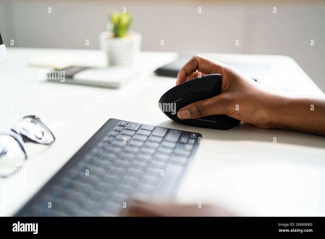 African American Woman With Wrist Pain Using Ergonomic Vertical Mouse ...