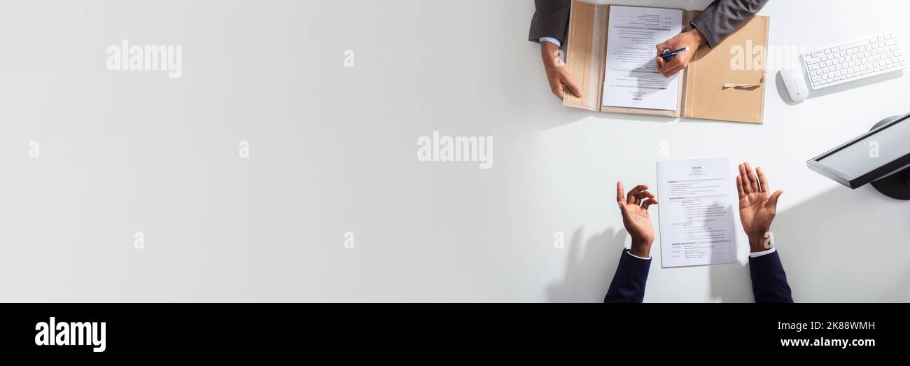 HR Interview Top View. African American Man Stock Photo - Alamy