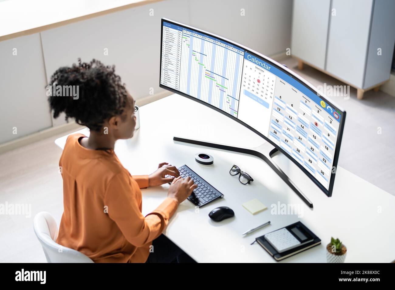 Woman Working On Calendar Agenda Schedule On Computer Stock Photo - Alamy
