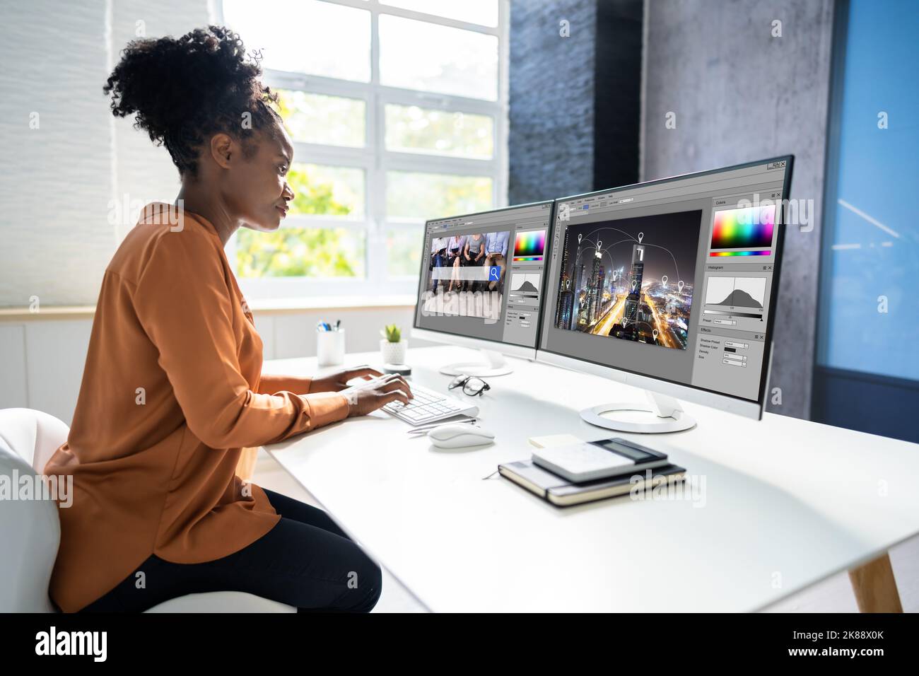 African Graphic Web Designer Using Design Editing Software Stock Photo ...