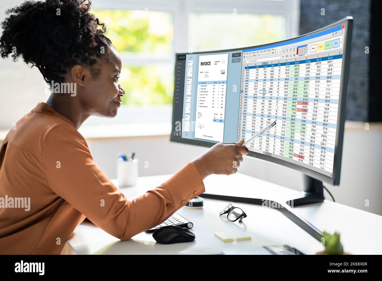 Medical Codes And Accounts Manager In Office With Bill Stock Photo - Alamy