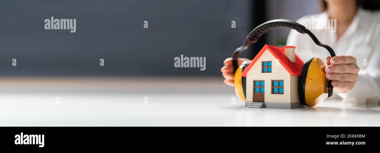 House Loud Noise Protection. Construction Sound Protection Stock Photo ...