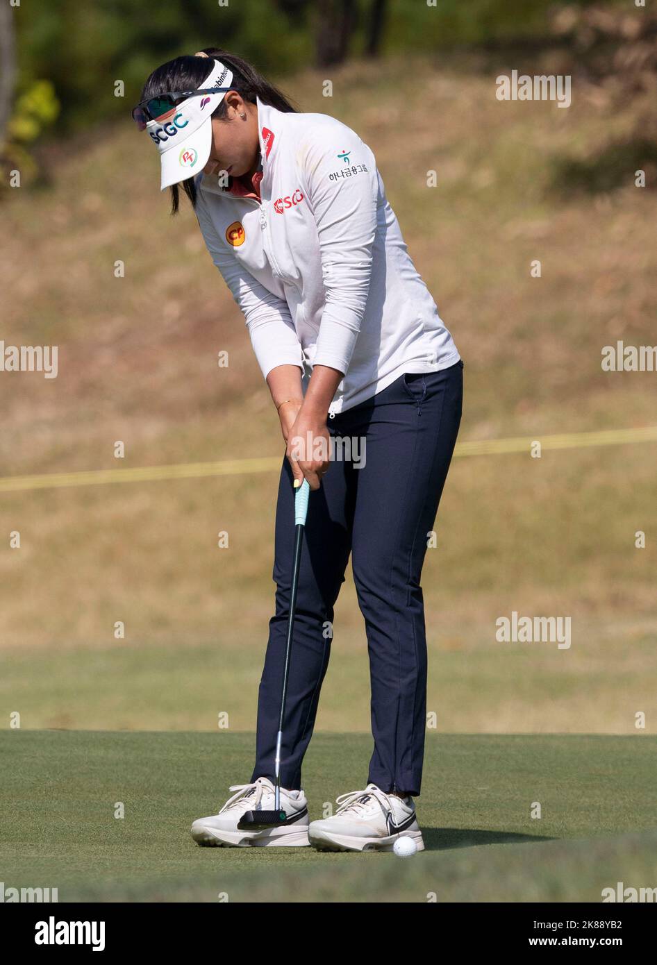 21 October 2022 - Wonju, South Korea : Atthaya Thitikul of Thailand putts on the green of five ...