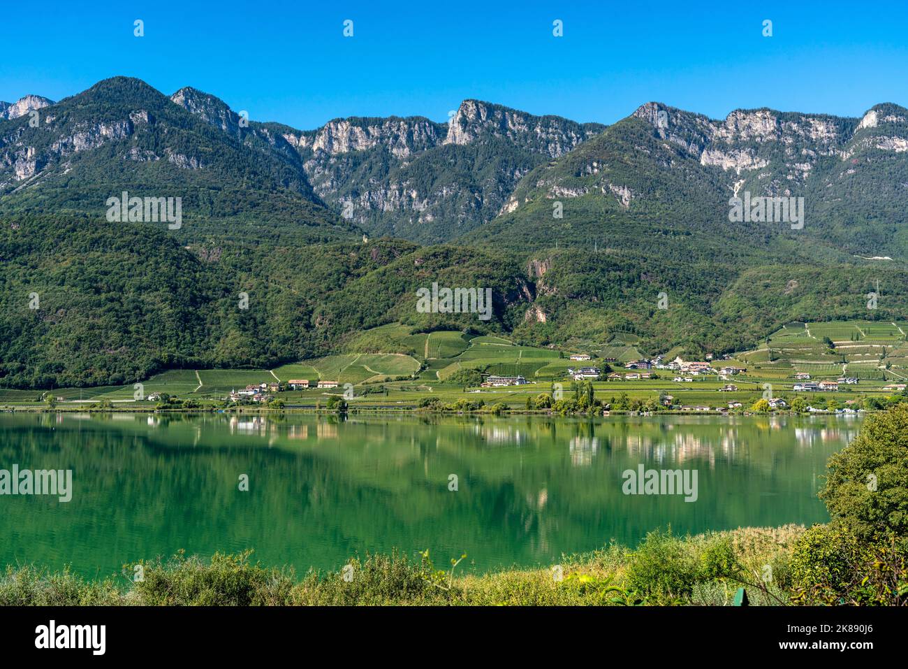 Lake Kaltern, near the village of Kaltern, in the Adige Valley in South ...