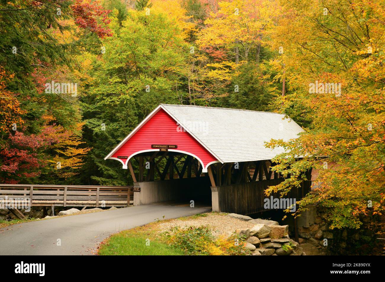 A True Autumn New England Scene: a Covered Bridge Surrounded by ...