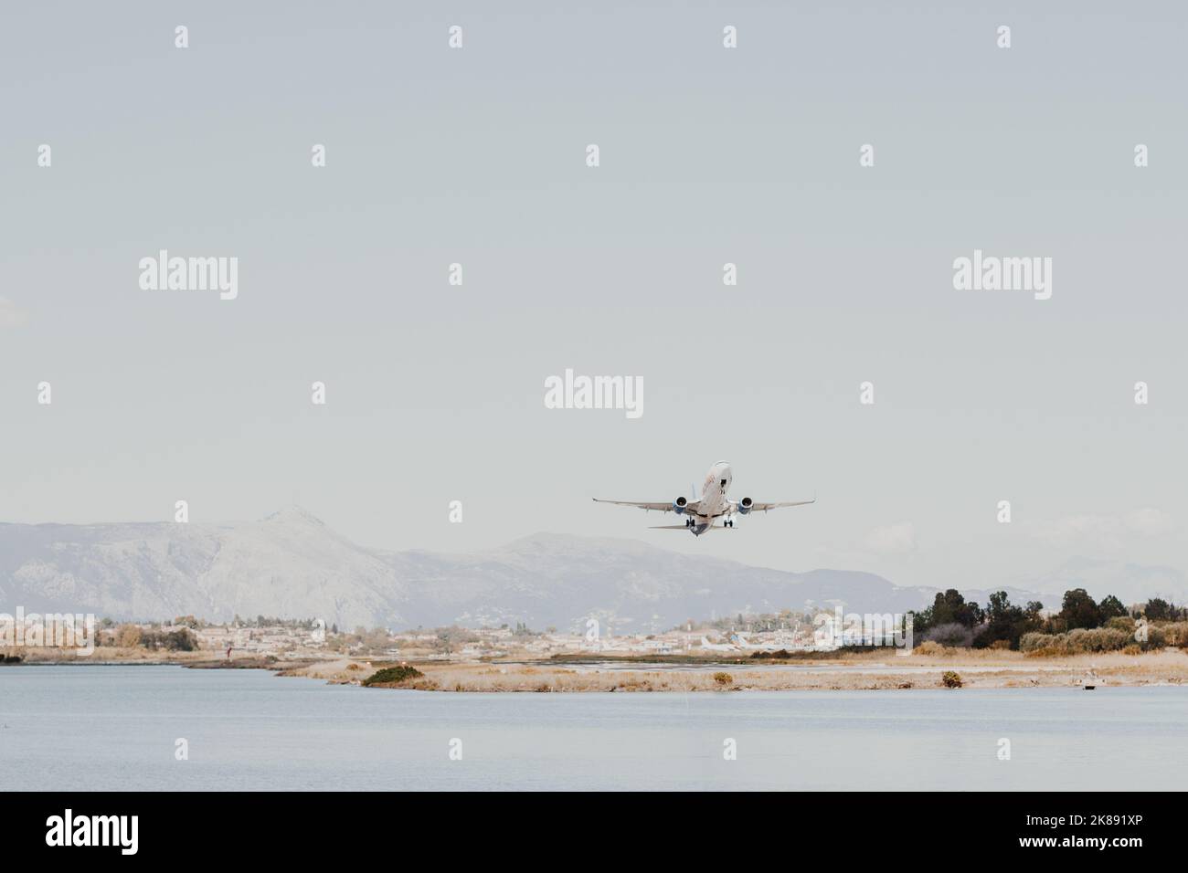 2022.10.04 Greece, Corfu - the plane takes off from the airport over ...