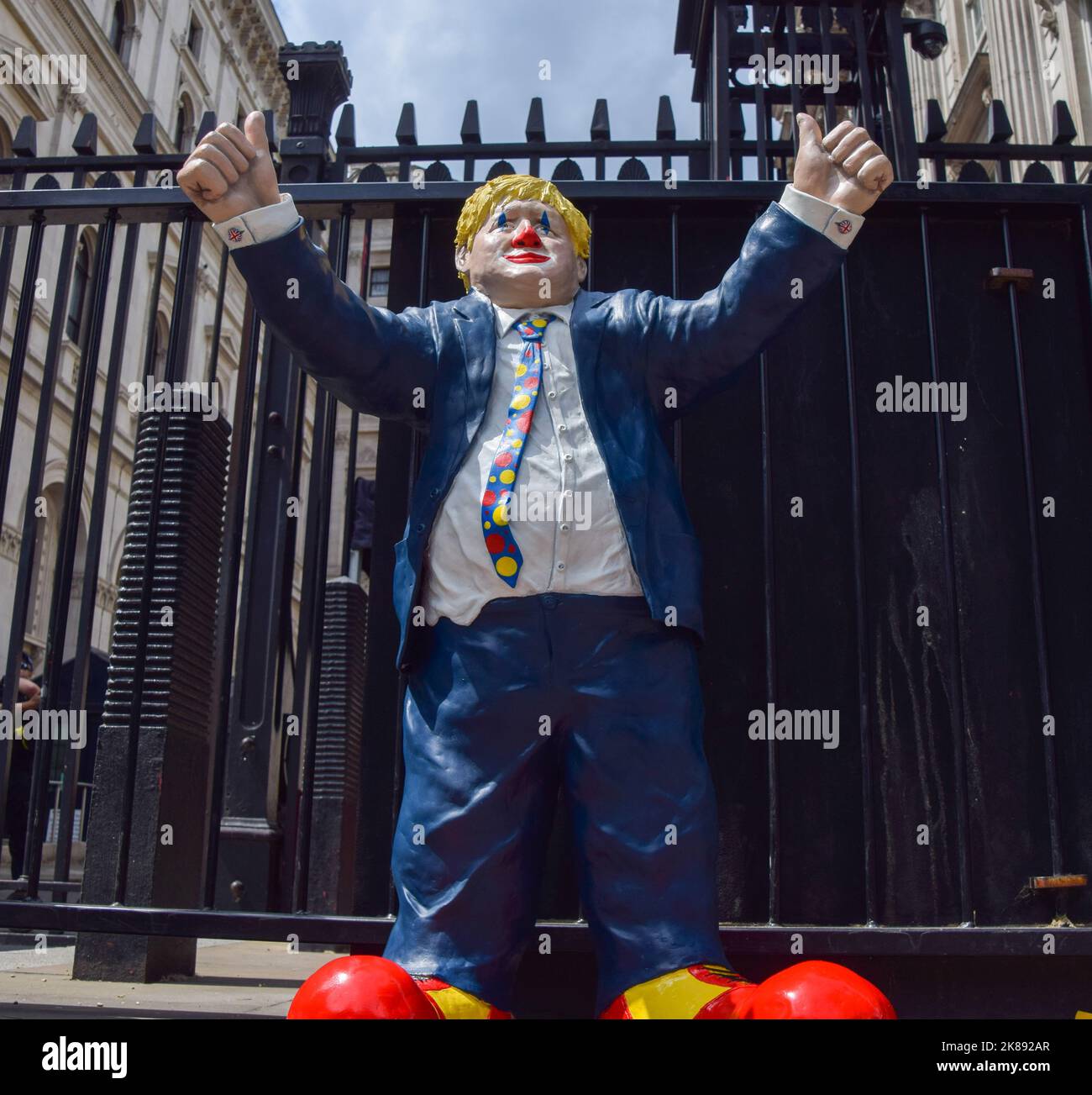 London, UK. 13th July 2022. A figure of Boris Johnson as a clown ...