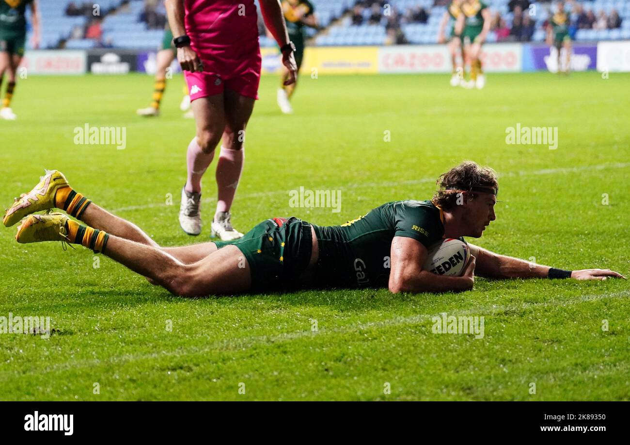 Australia's Campbell Graham scores his side's eleventh try of the game ...