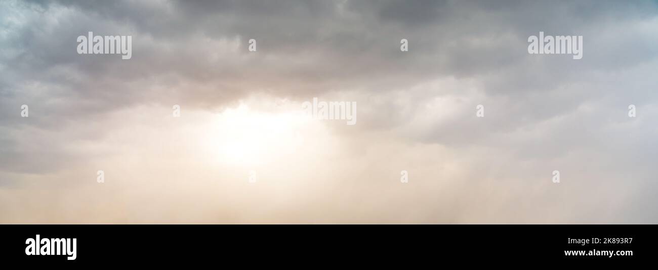 Dramatic Sky Background with sunny beams. Panoramic view of Stormy ...