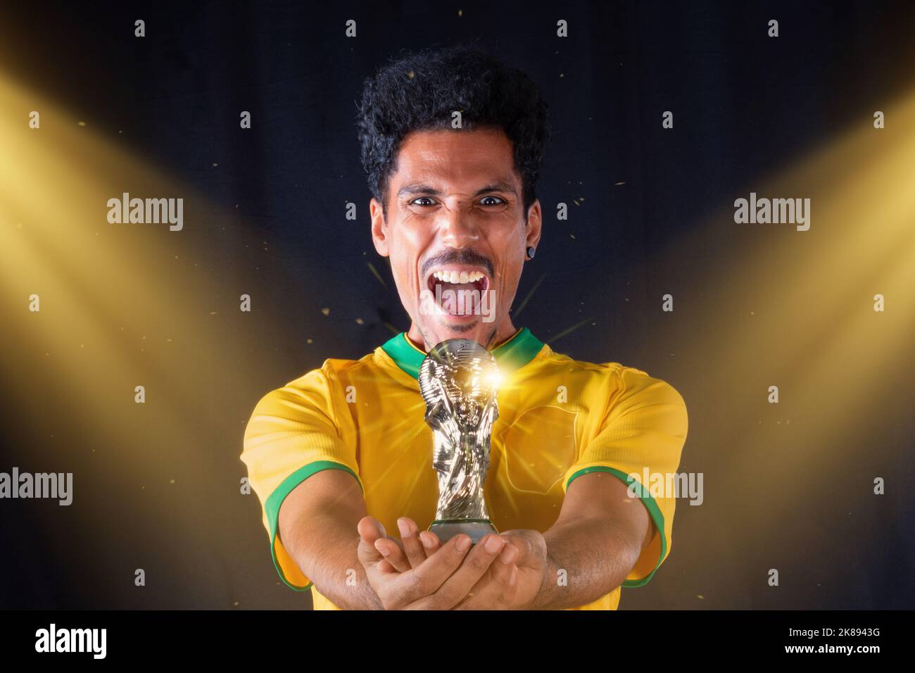 Football celebrating holding trophy hi-res stock photography and images ...