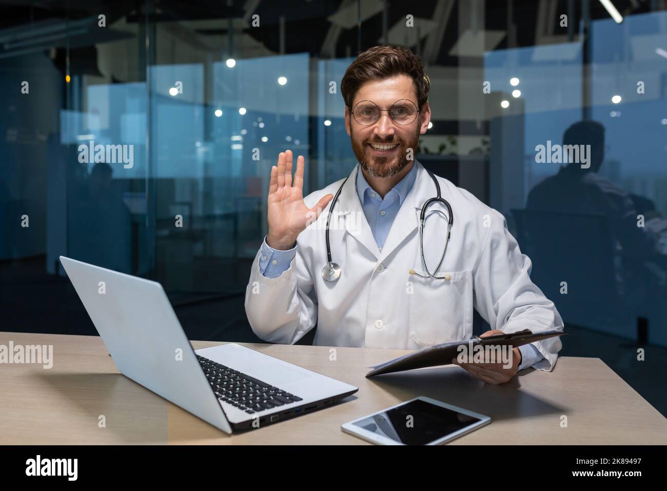Portrait of successful mature doctor inside modern clinic, man working ...