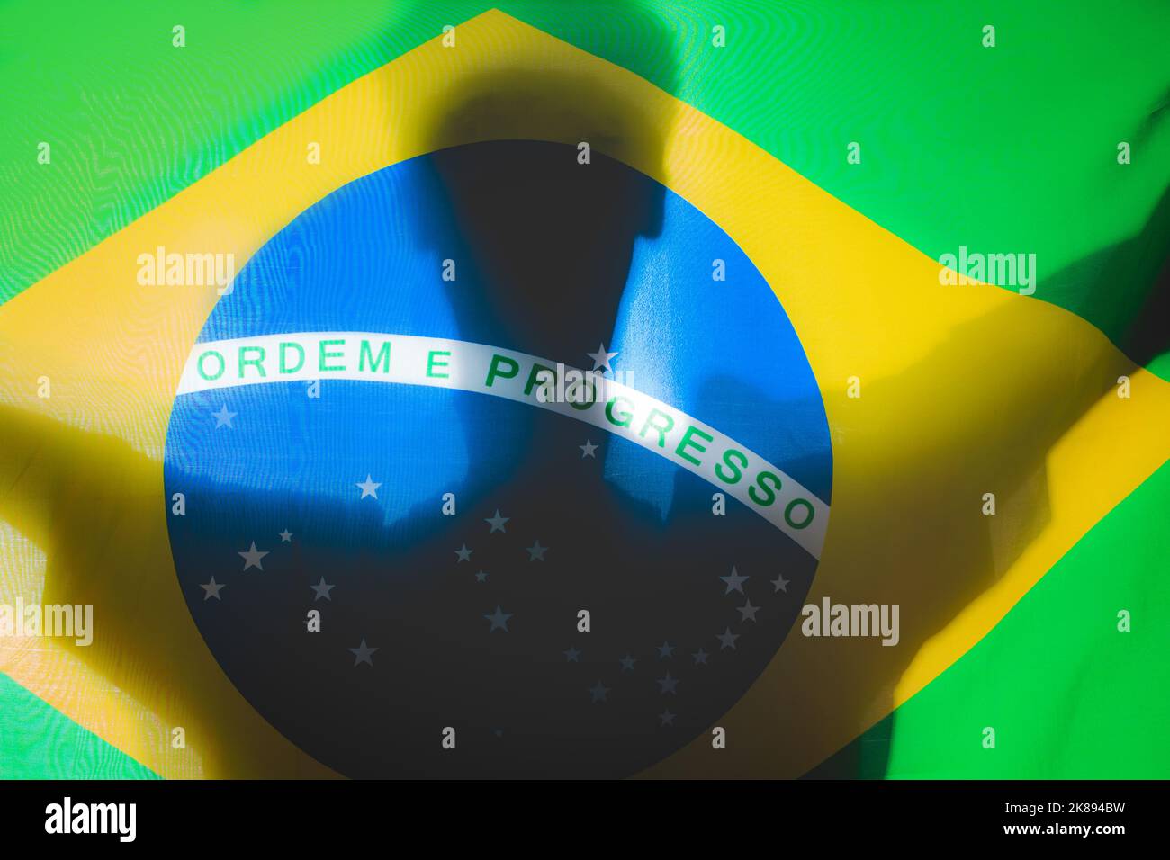 Brazilian Power - Silhouette on the Brazilian Flag Concept Brazilian ...
