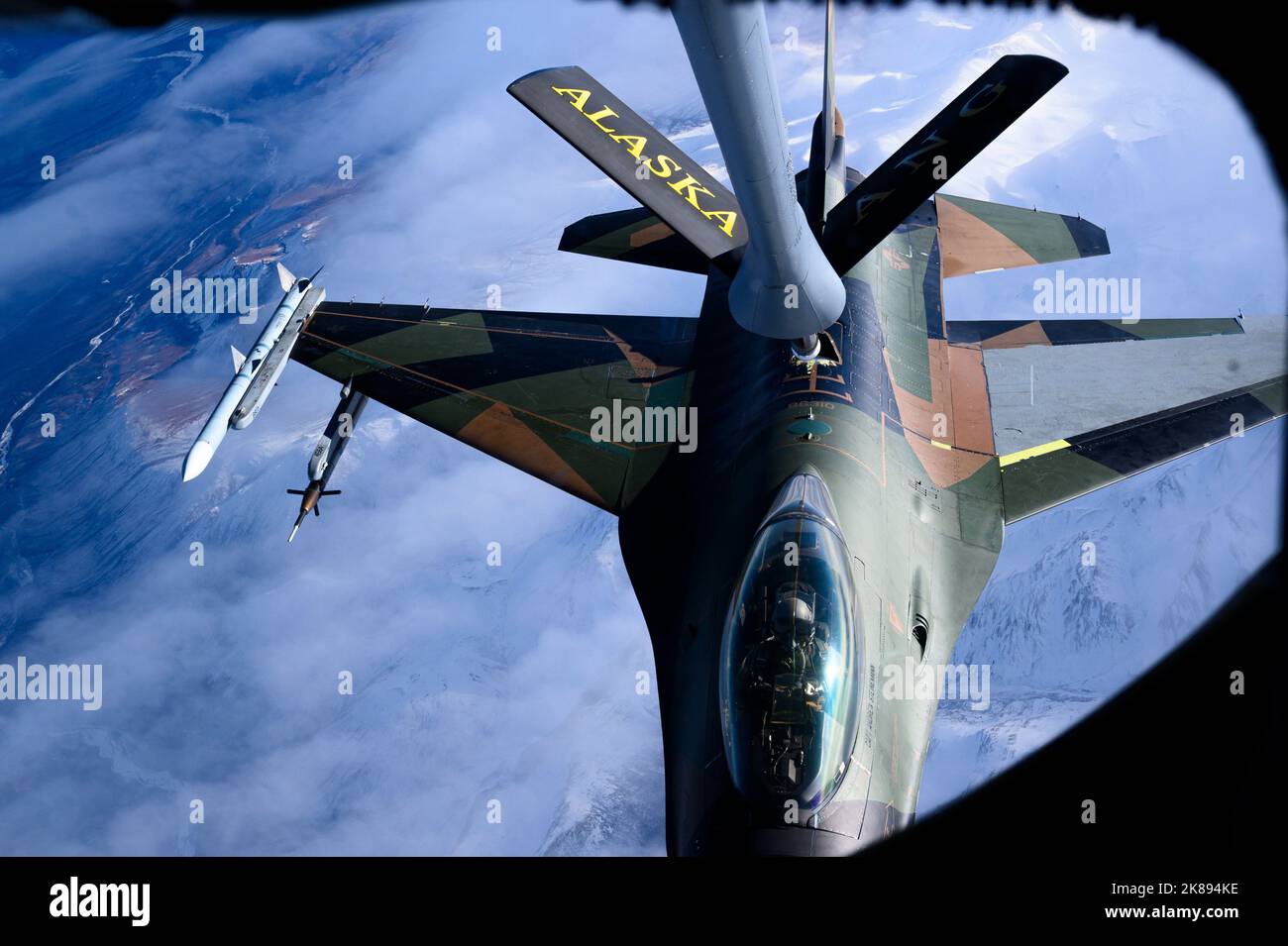 A U.S. Air Force F-16 Fighting Falcon receives fuel from the 168th Air ...