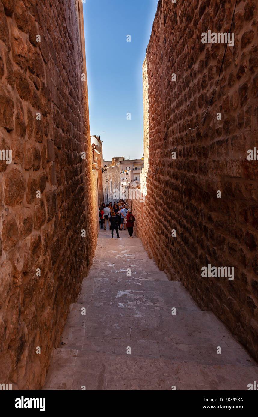 Mardin, Turkey - October 2022: Tourists wandering the narrow streets of ...