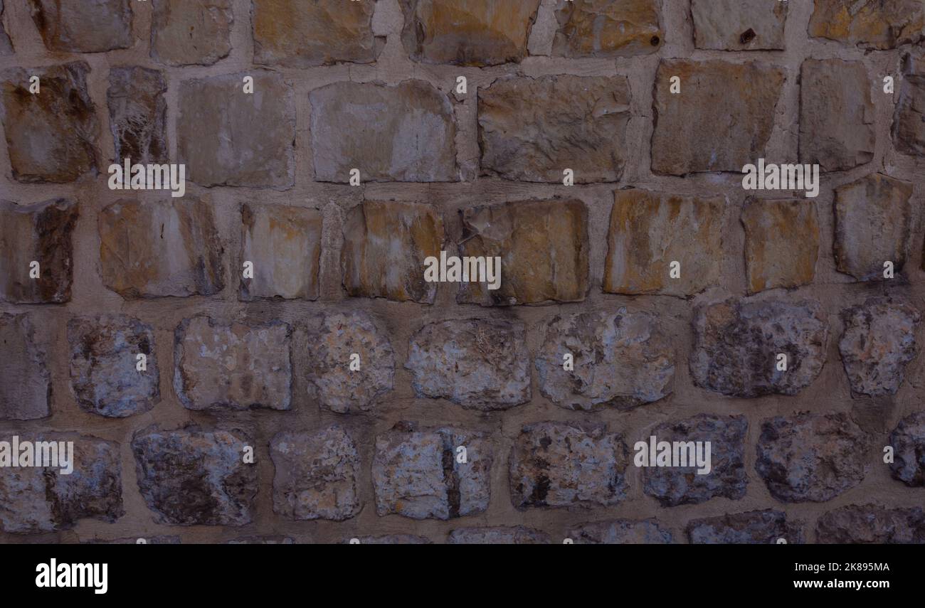 A view of an old stone wall. Close-up stone wall background Stock Photo ...
