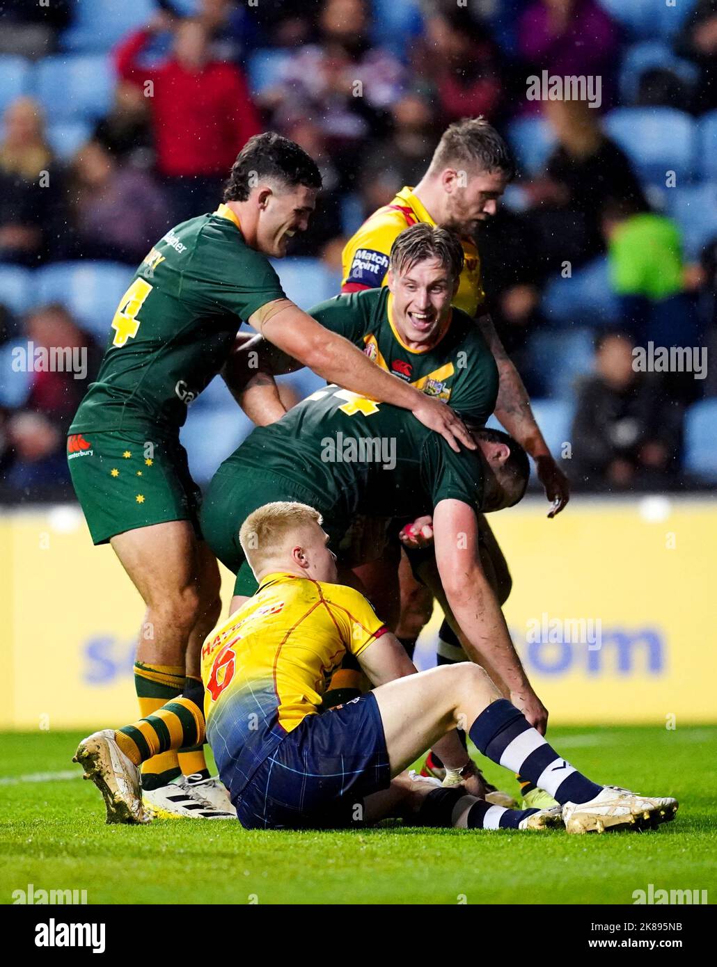 Australia's Isaah Yeo celebrates with his team-mates after scoring ...