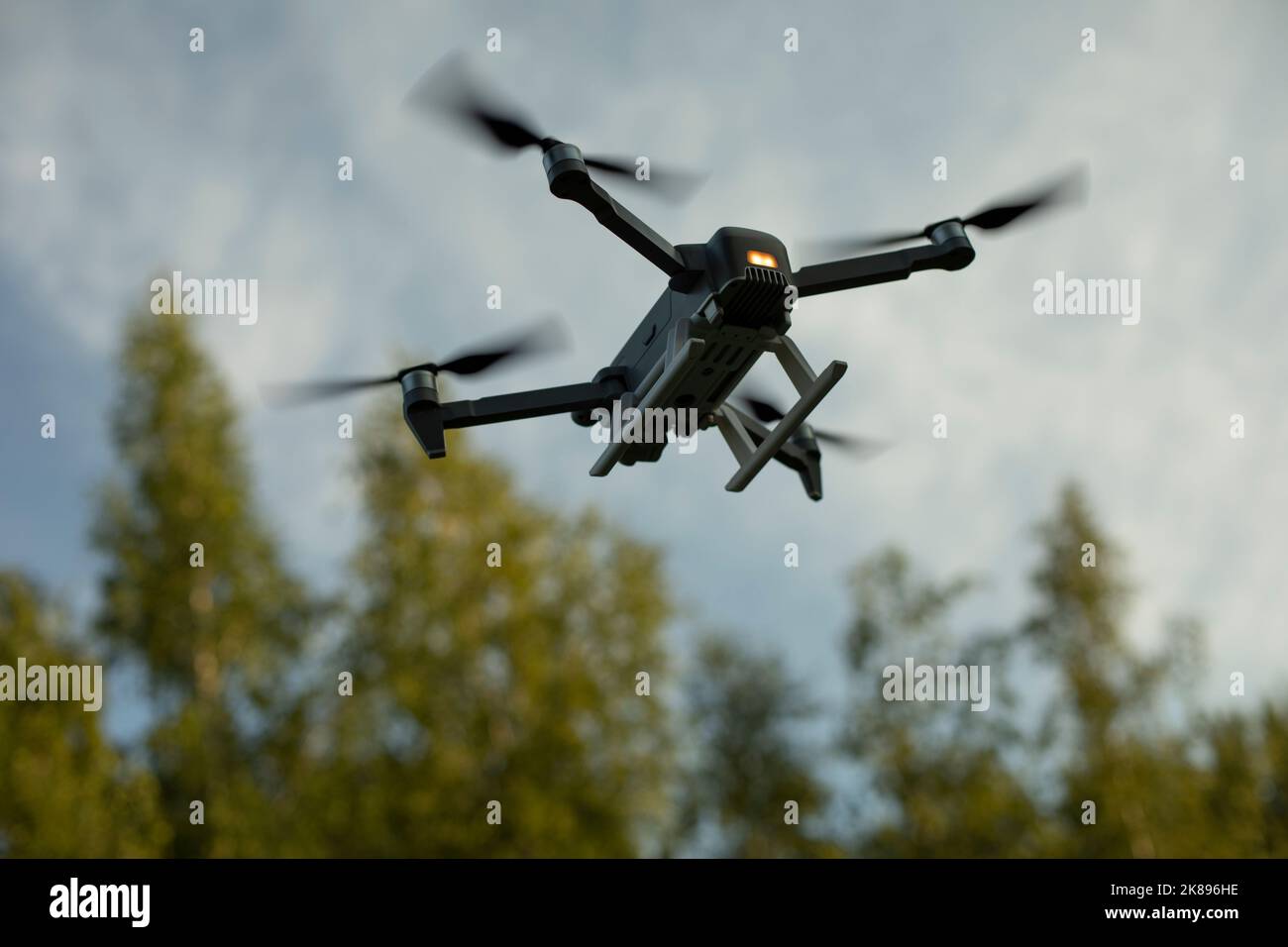 Drone flies low. Drone flight in sky. Technology of flight and shooting ...
