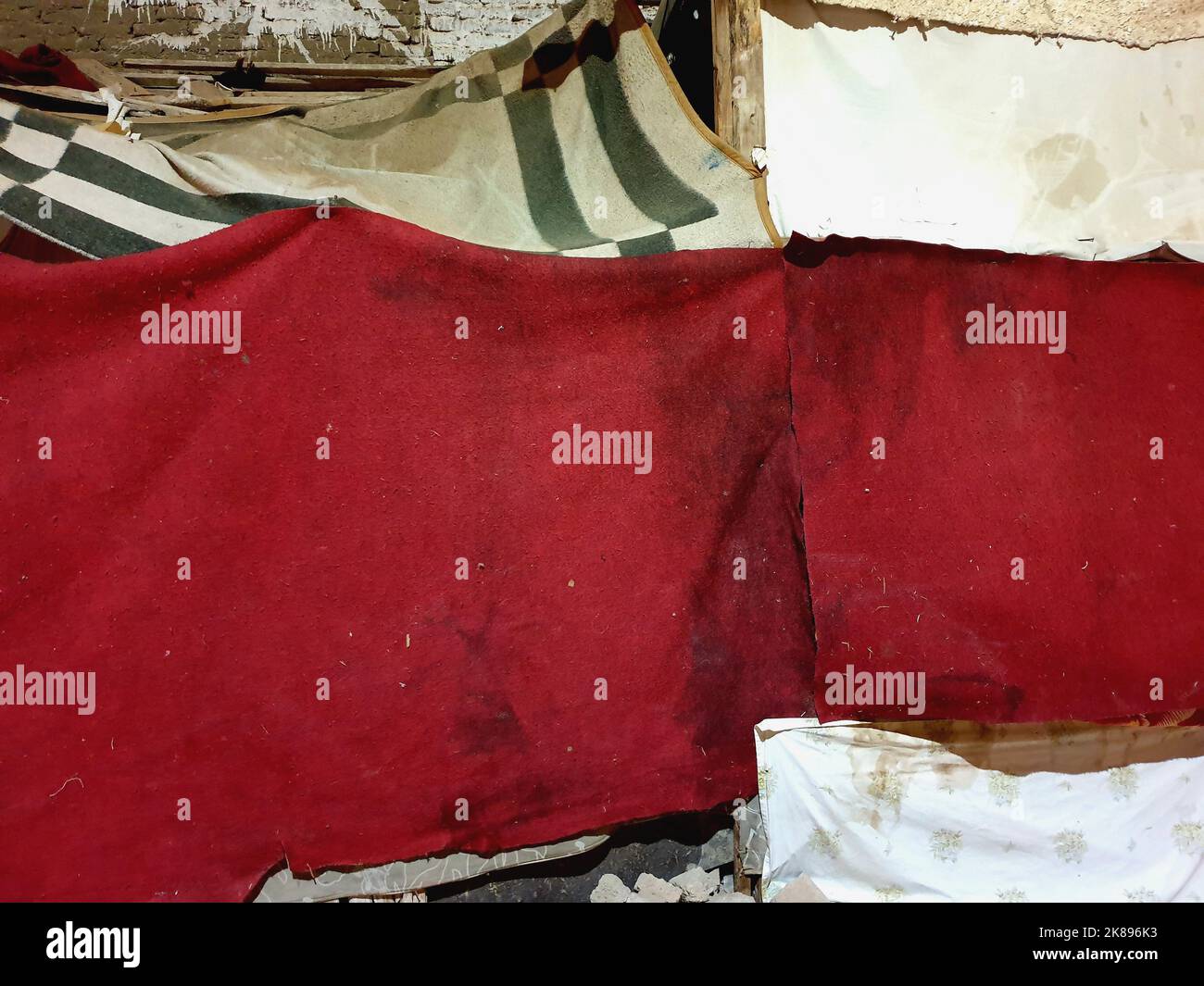 Bright abstraction, artistic background, red rags on a white wall Stock ...