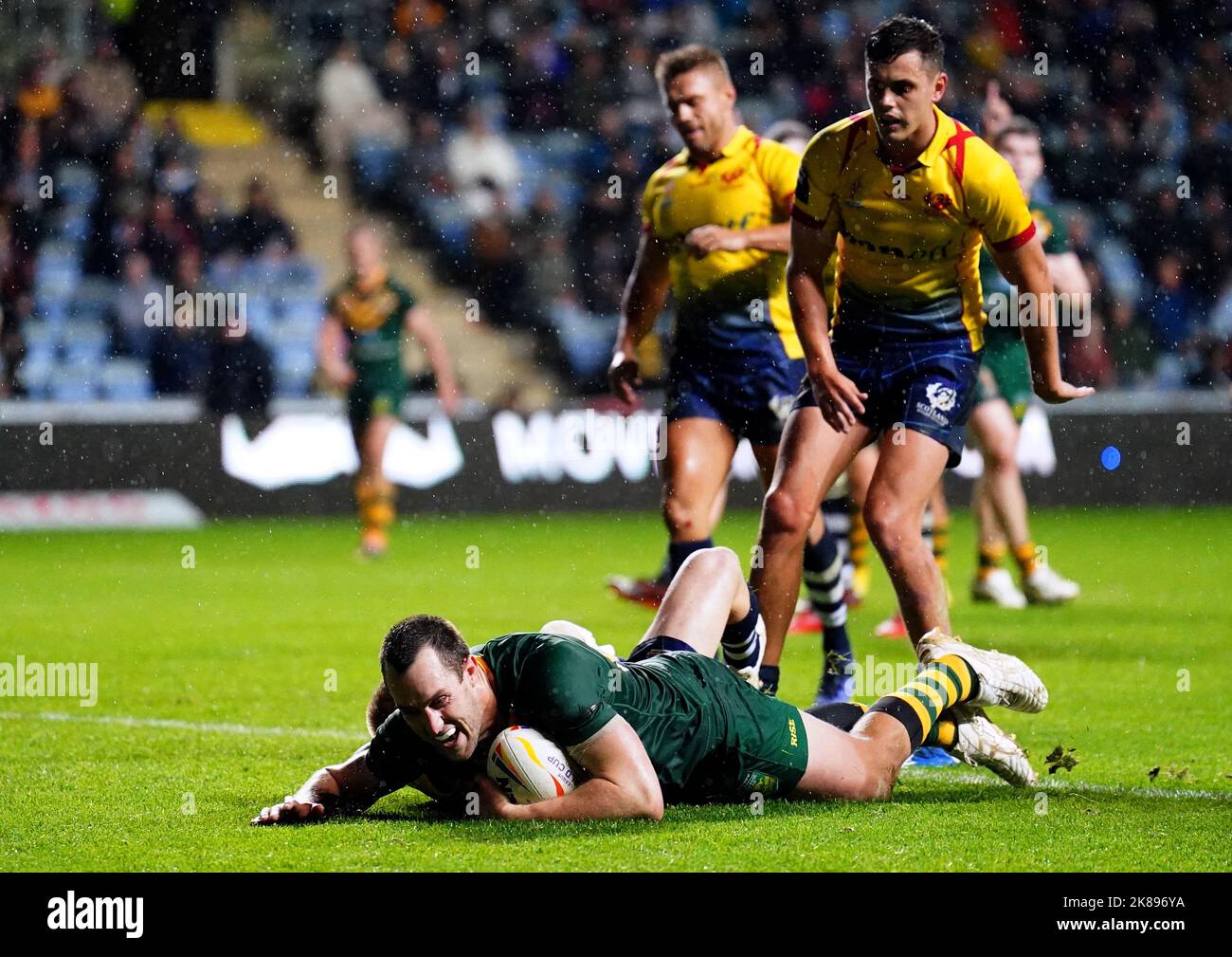 Australia's Isaah Yeo scores his side's fourteenth try of the game ...