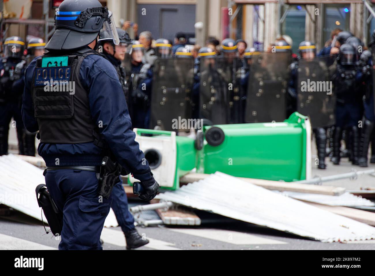 Paris, France. 18th Oct, 2022. Riot police clear barricades erected by ...