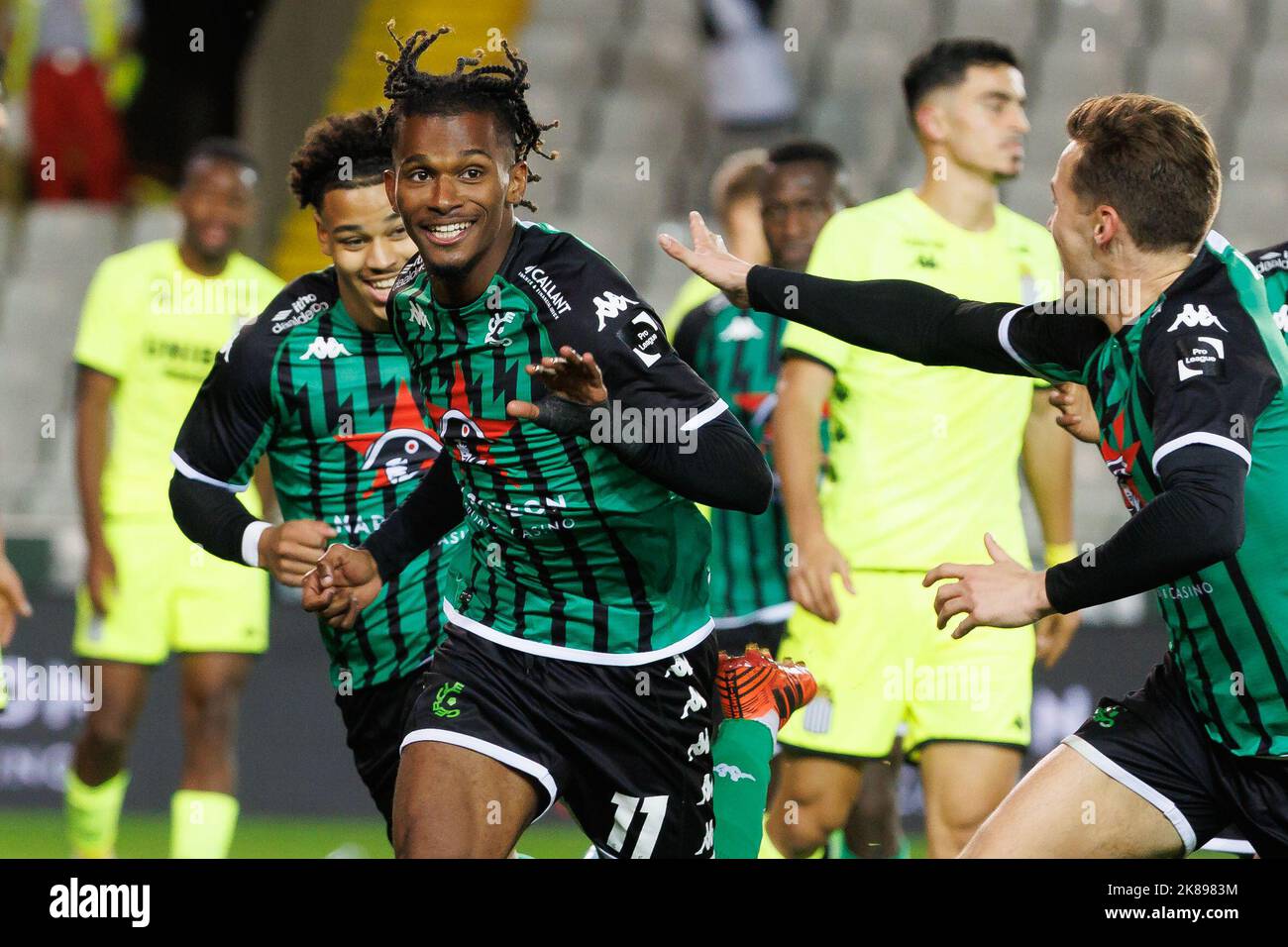 Cercle's Yann Gboho celebrates after scoring during a soccer match ...