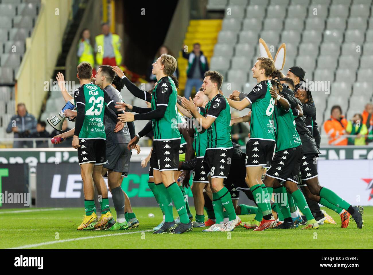 Cercle's players celebrate after winning a soccer match between Cercle ...