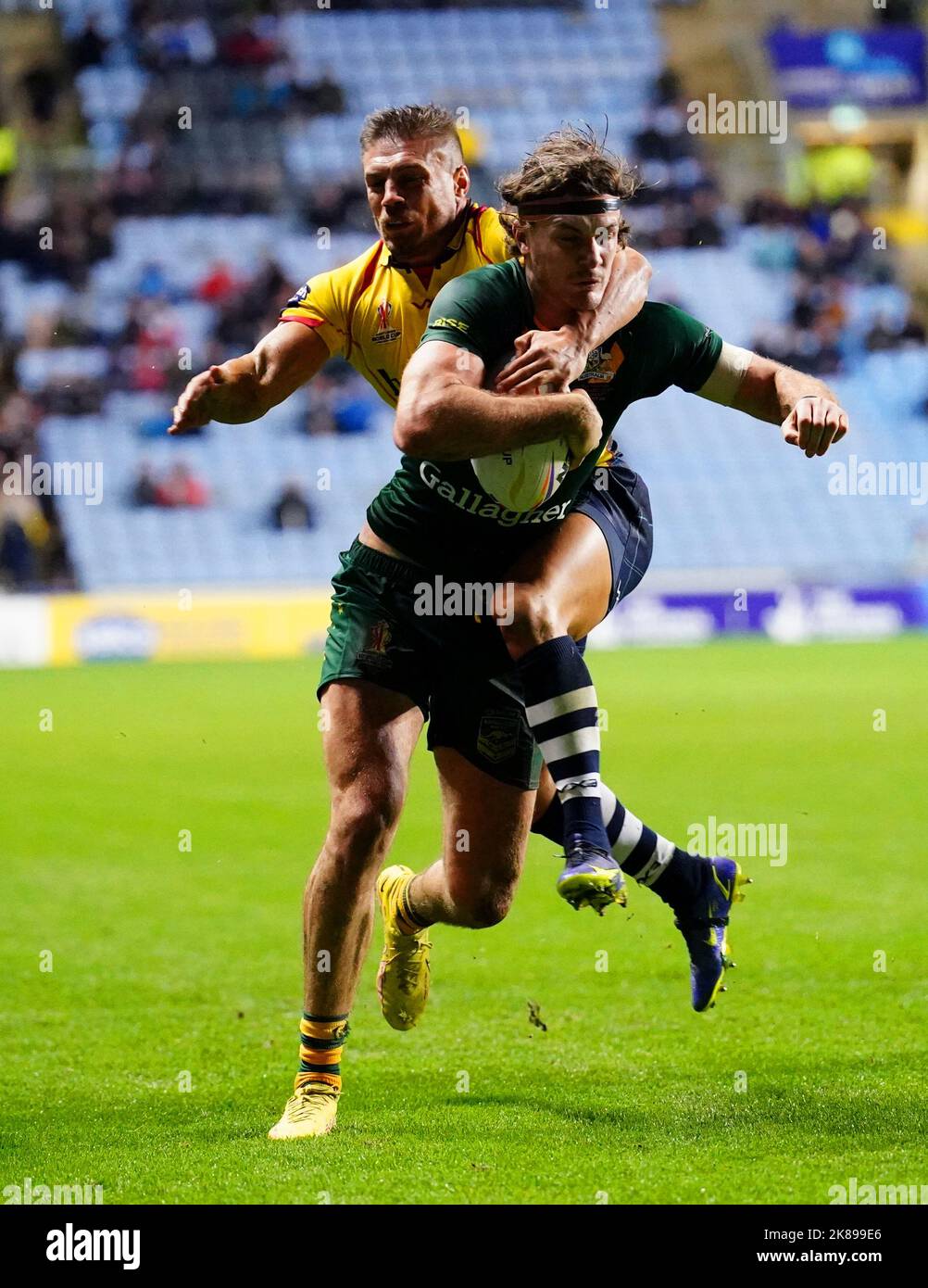 Australia's Campbell Graham (right) is tackled by Scotland's Matty ...