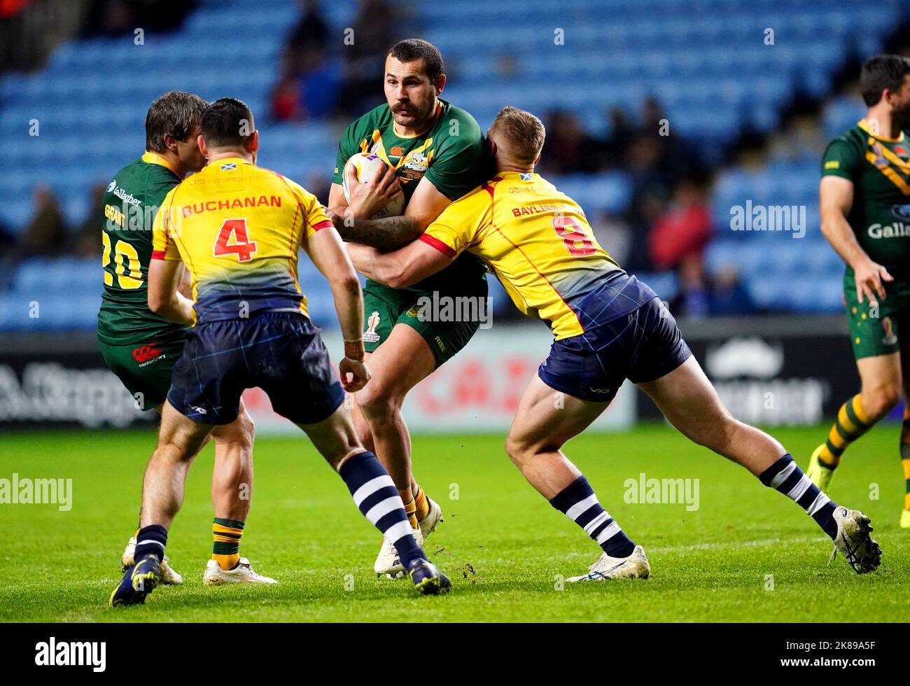 Australia's Reagan Campbell-Gillard (centre) is tackled by Scotland's ...