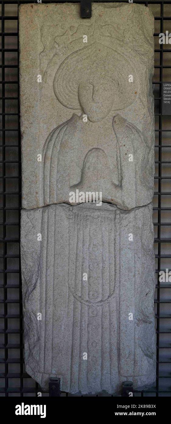 Tombstone with prayer figure in bas-relief Stock Photo - Alamy