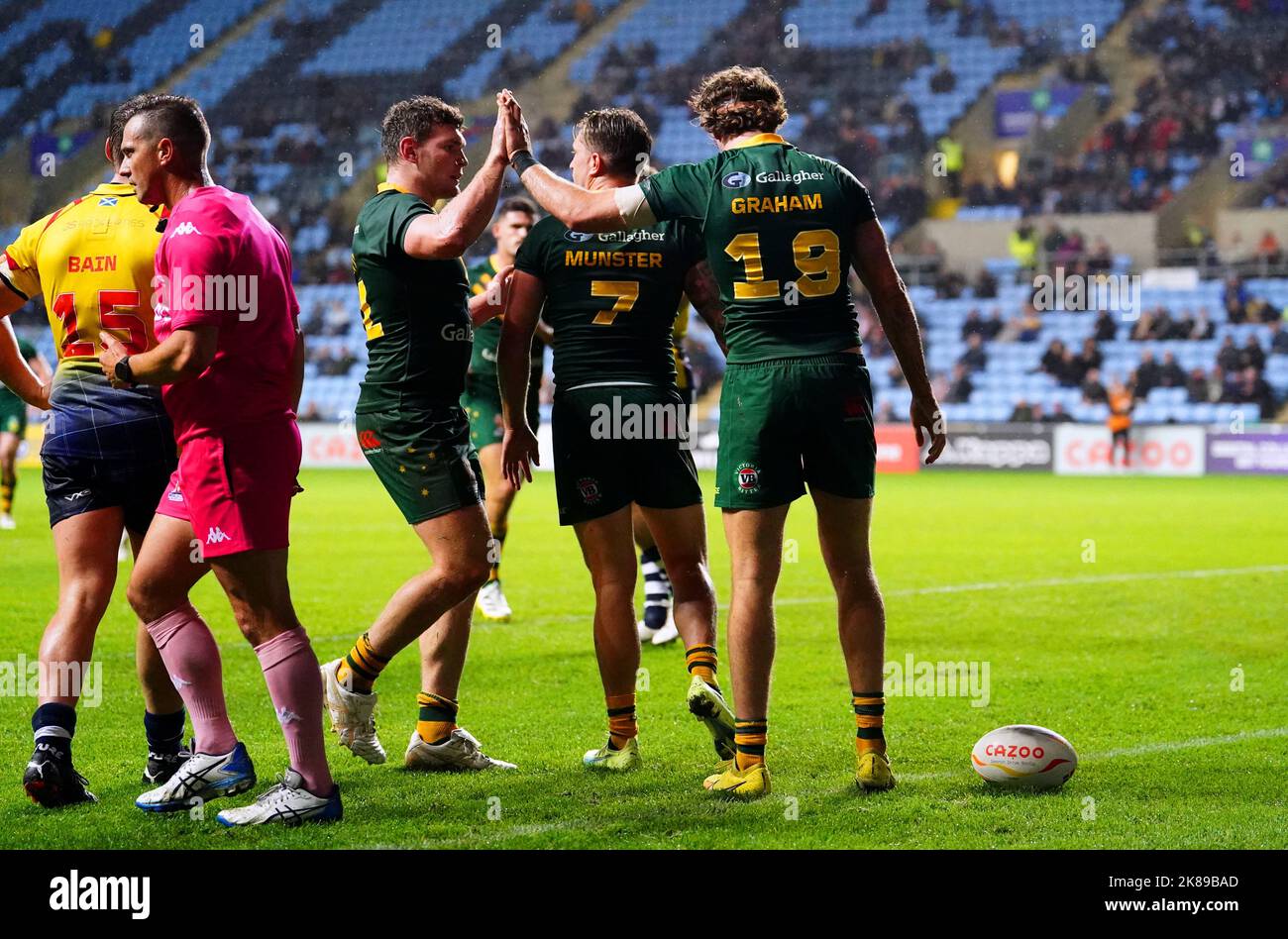 Australia's Campbell Graham (right) celebrates after scoring his side's ...