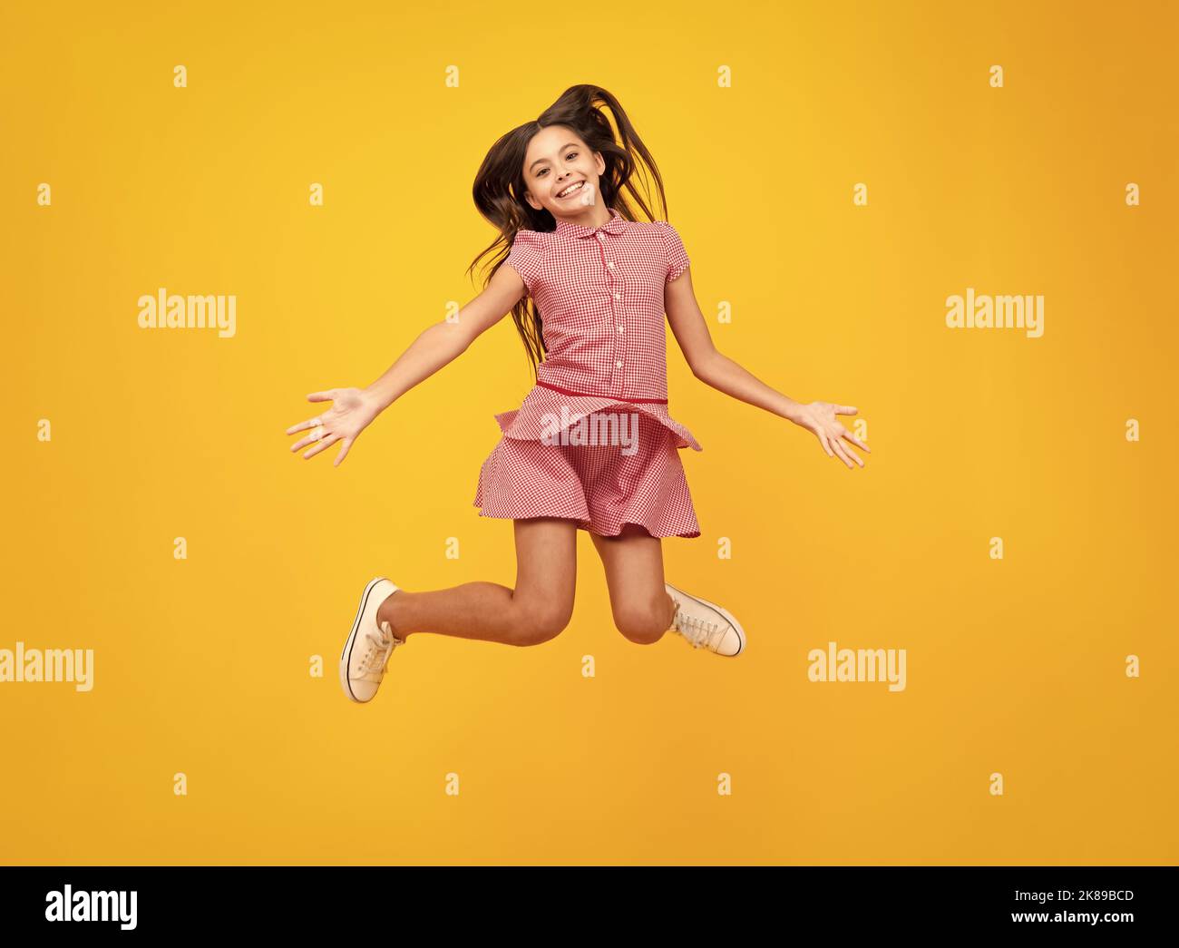 Full size length of young brunette girl teen student jump run go move ...