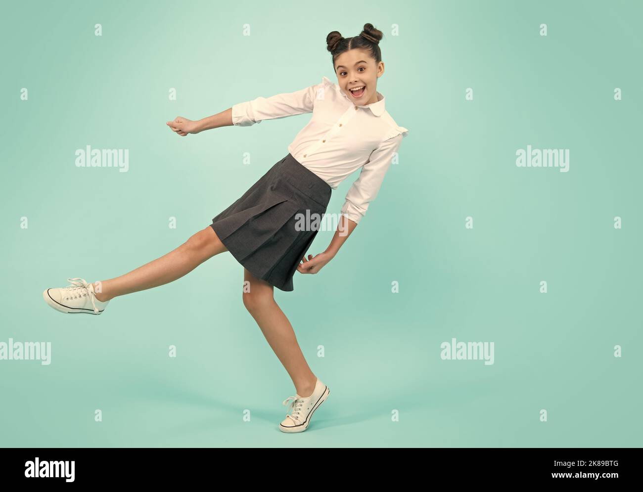 Happy schoolgirl, positive and smiling emotions of teen girl. Full ...