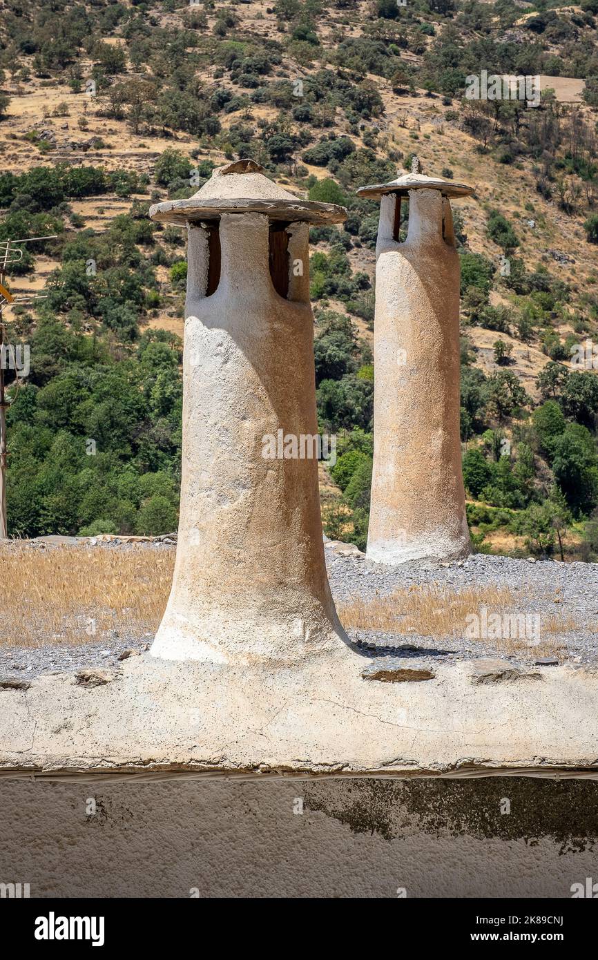 Traditional Alpujarras rooftop with chimneys in Pampaneira, a small ...