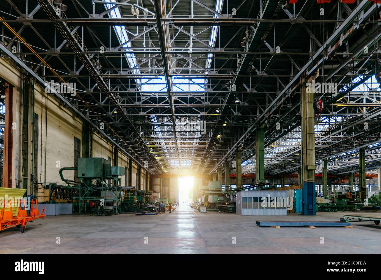 Heavy mechanical engineering factory production line. Interior of large ...