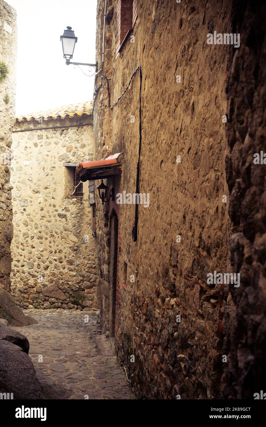 Old stone Ancient European medieval passageway alley with steps and ...