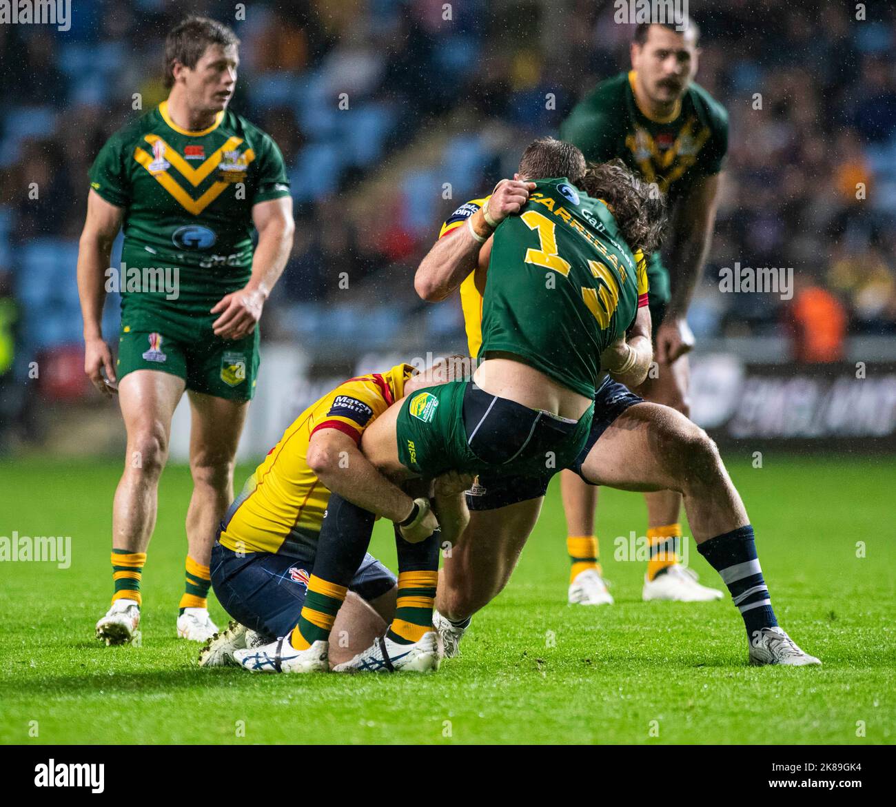 Coventry England 21st October: Patrick Carrigan of Australia is held by ...