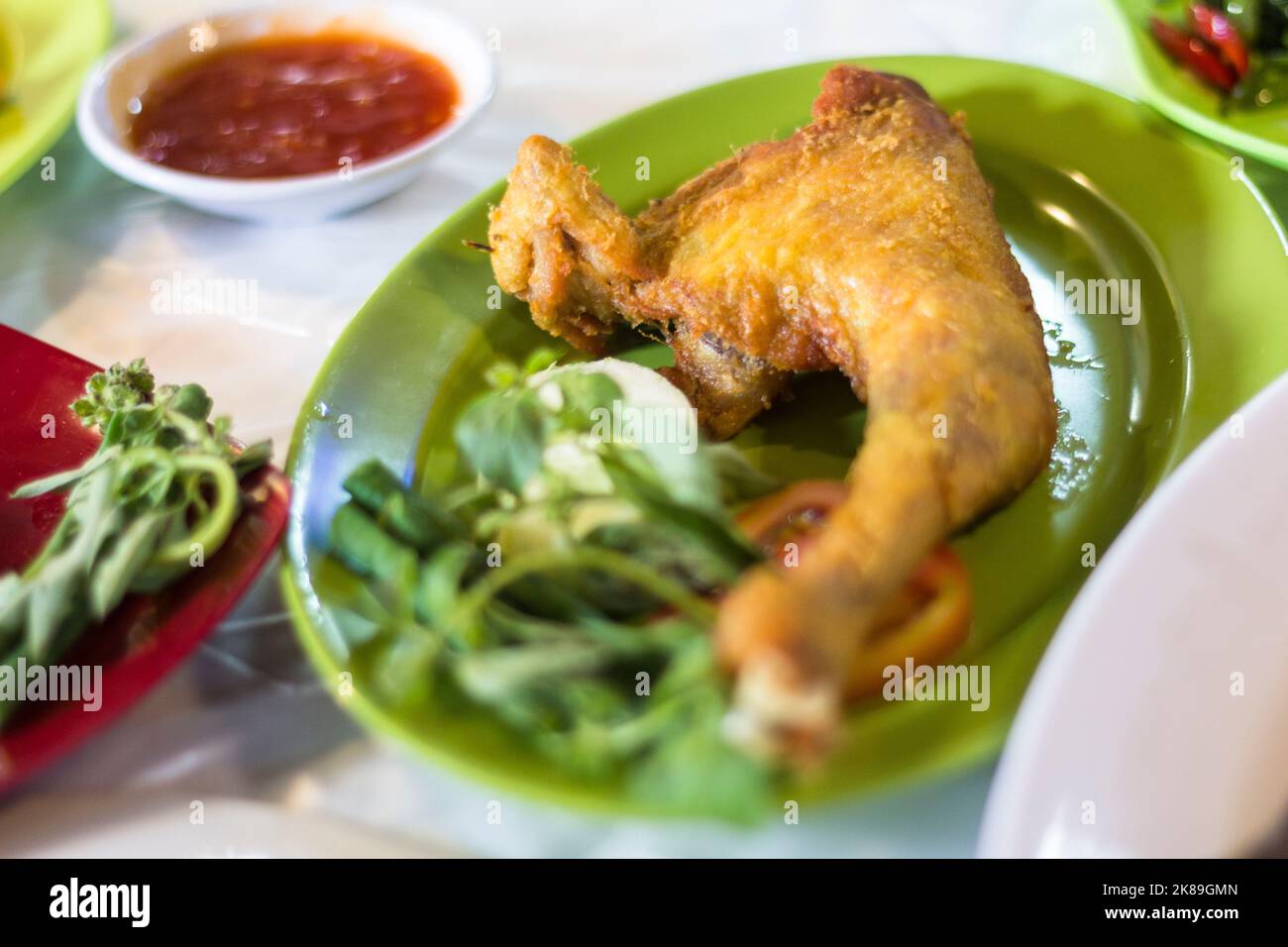 Fried chicken locally called ayam goreng at a local restaurant in ...