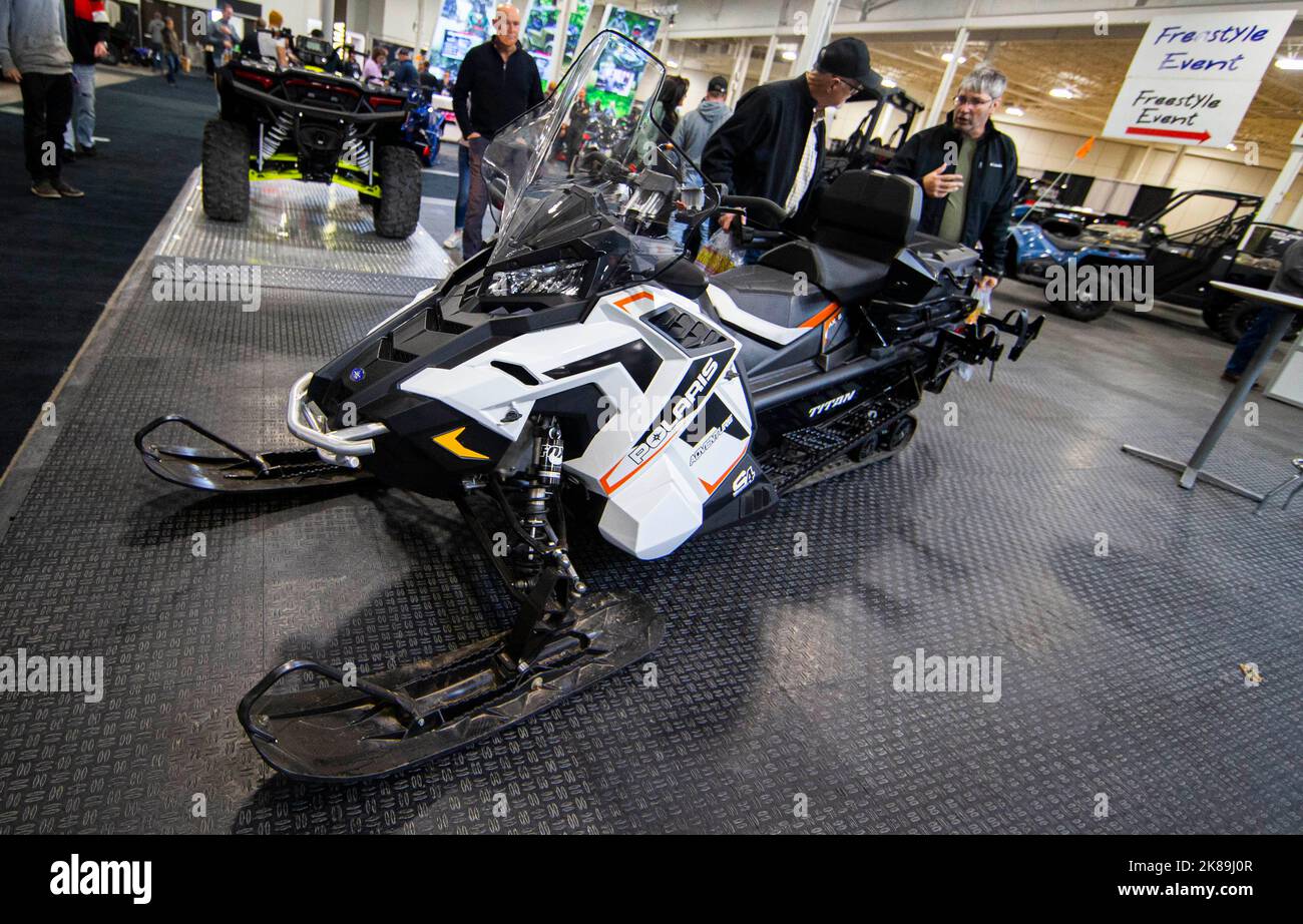 Mississauga, Canada. 21st Oct, 2022. People look at a snowmobile during ...