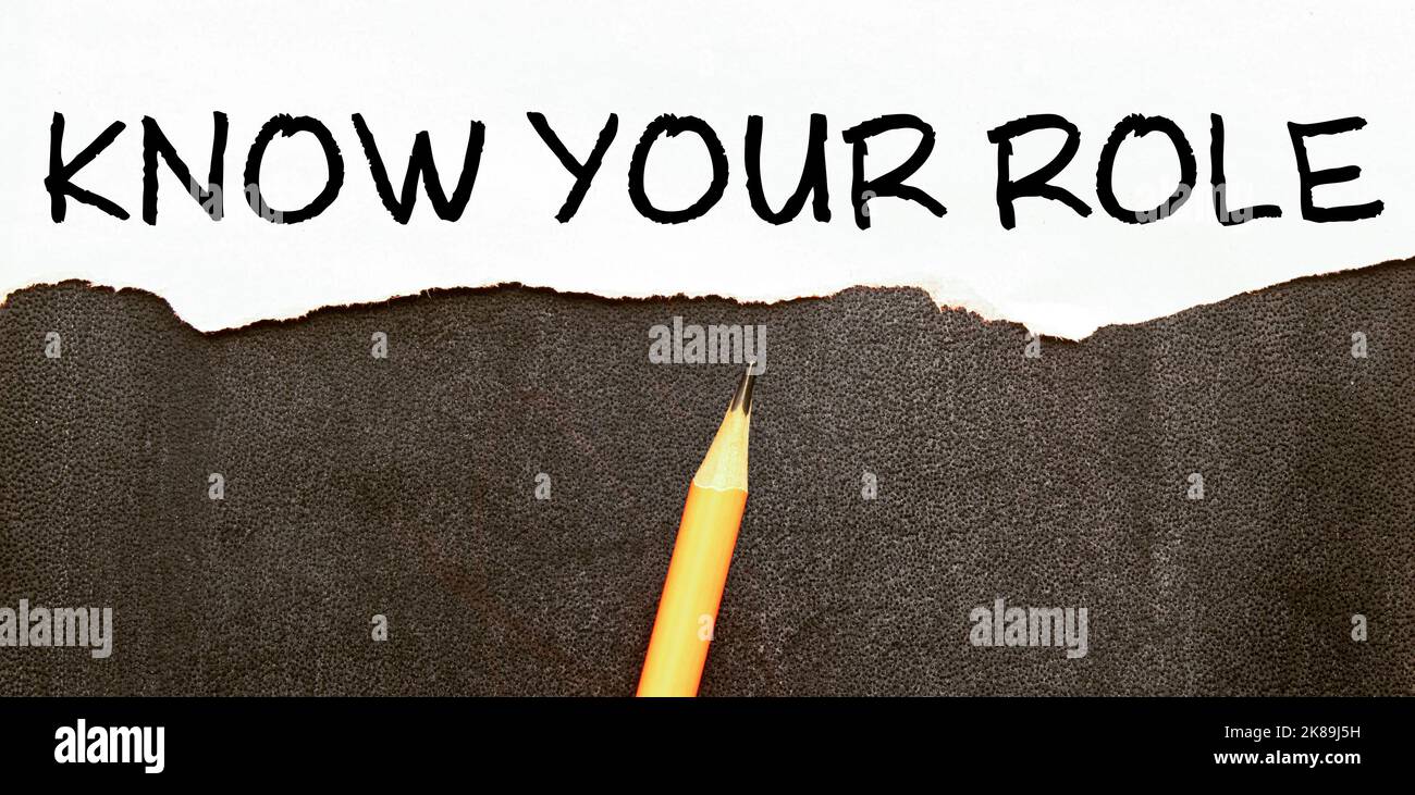 Text sign showing hand written words Know your role Stock Photo - Alamy