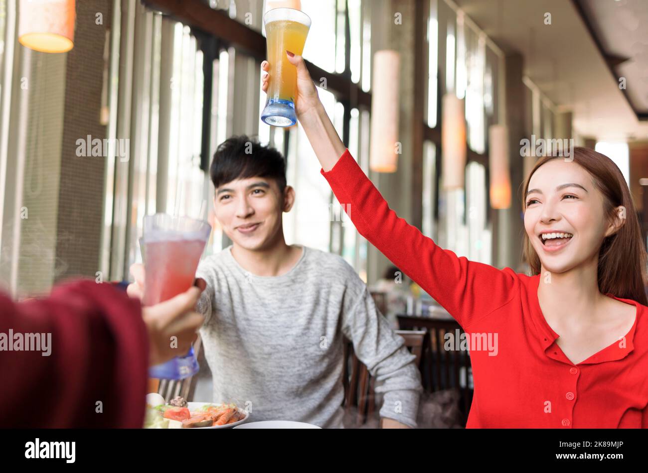 Friends toasting lunch hi-res stock photography and images - Alamy
