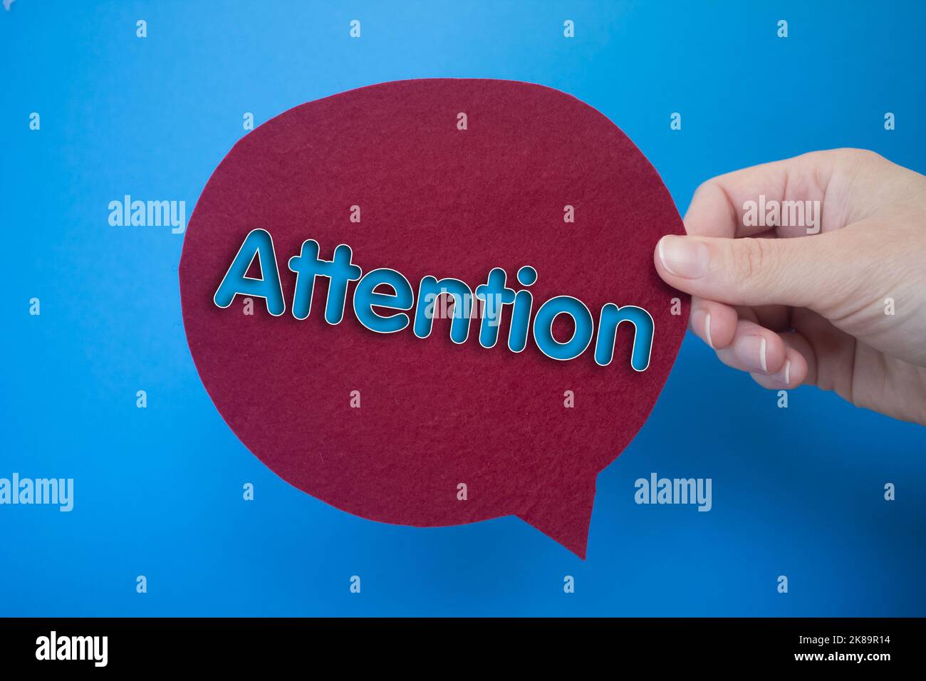 Speech bubble in front of colored background with Attention text Stock ...