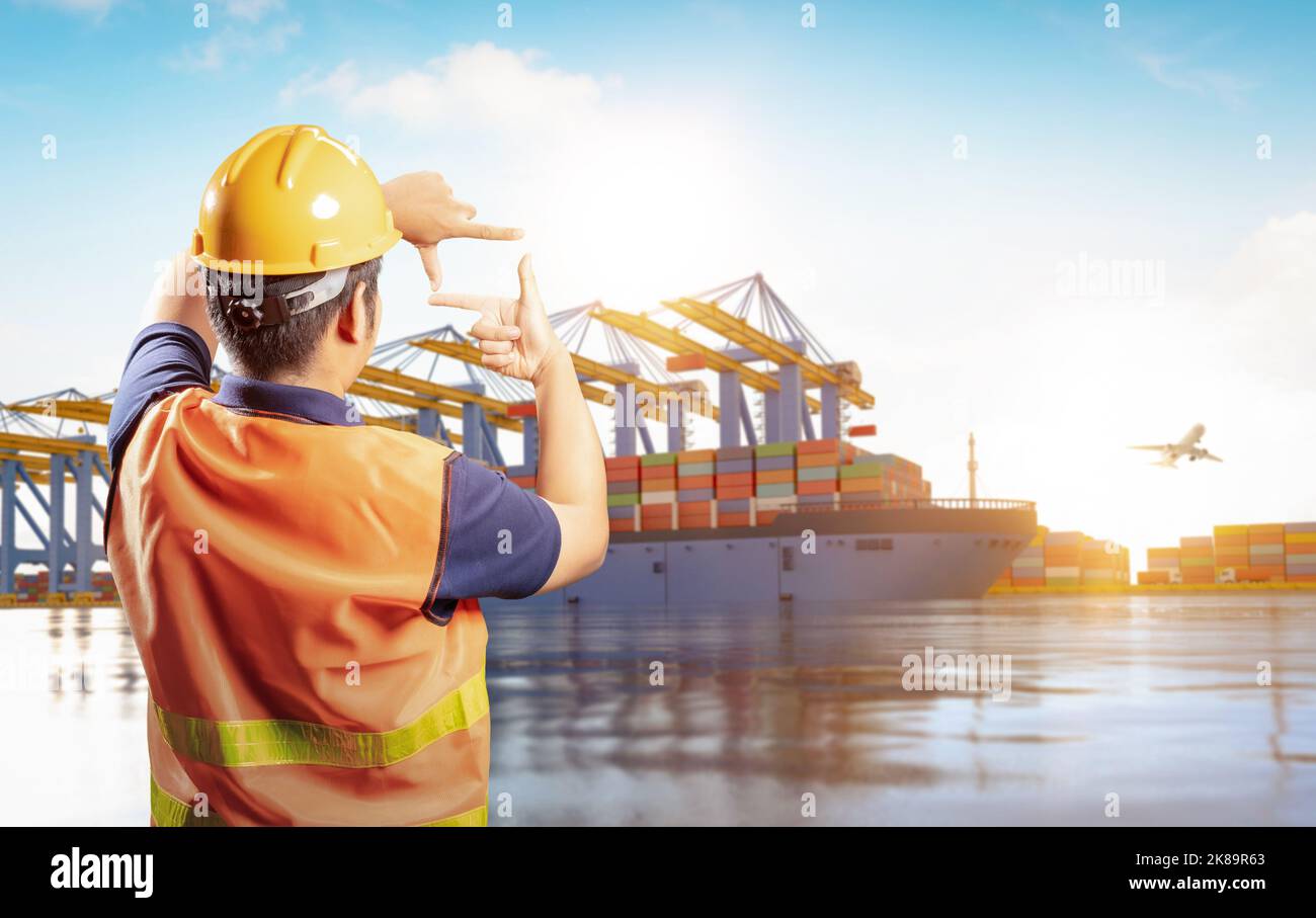 Engineer or asian worker work at container terminal port Stock Photo ...