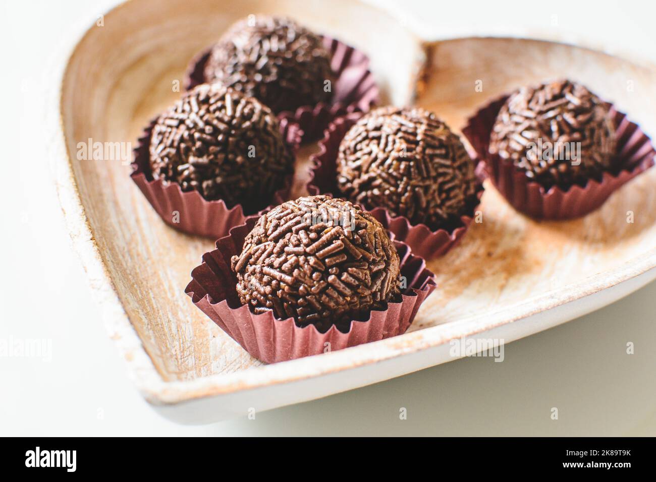 Brigadeiros, traditional Brazilian sweet, birthday party candy, on a ...